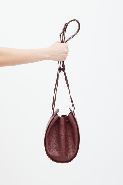 The Row // Burgundy Leather Drawstring Pouch Bag – VSP Consignment